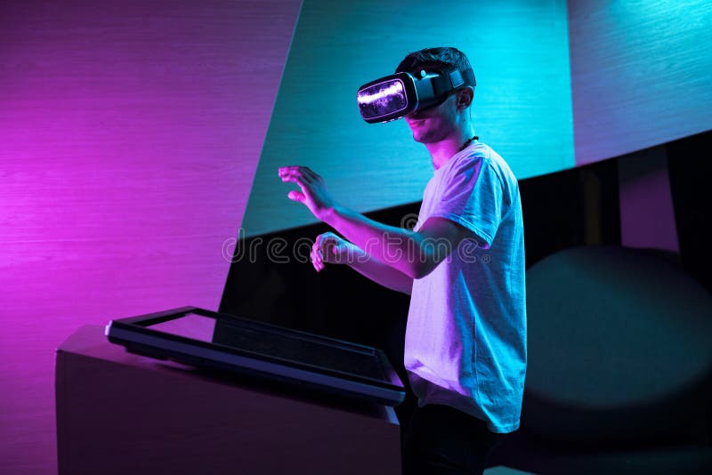 Man Using a VR Headset with Motion Tracking Tech, Make Hand Gestures in ...