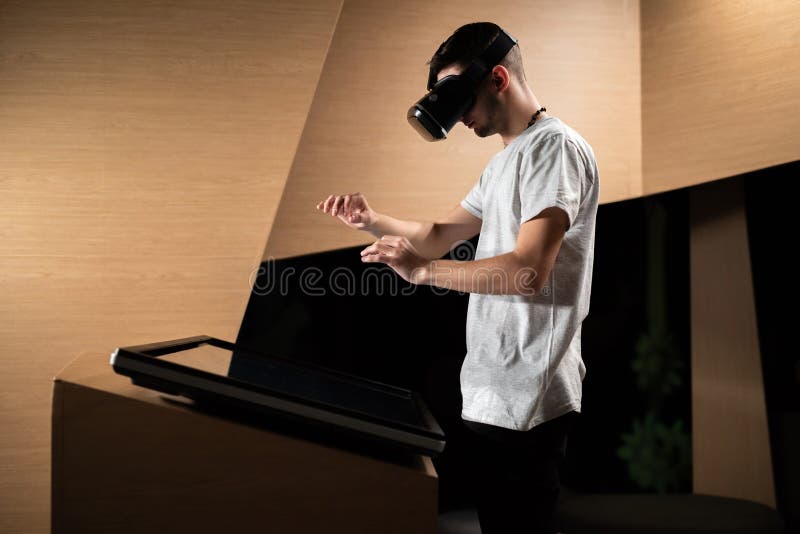 Man Using a VR Headset with Motion Tracking Tech, Make Hand Gestures in ...