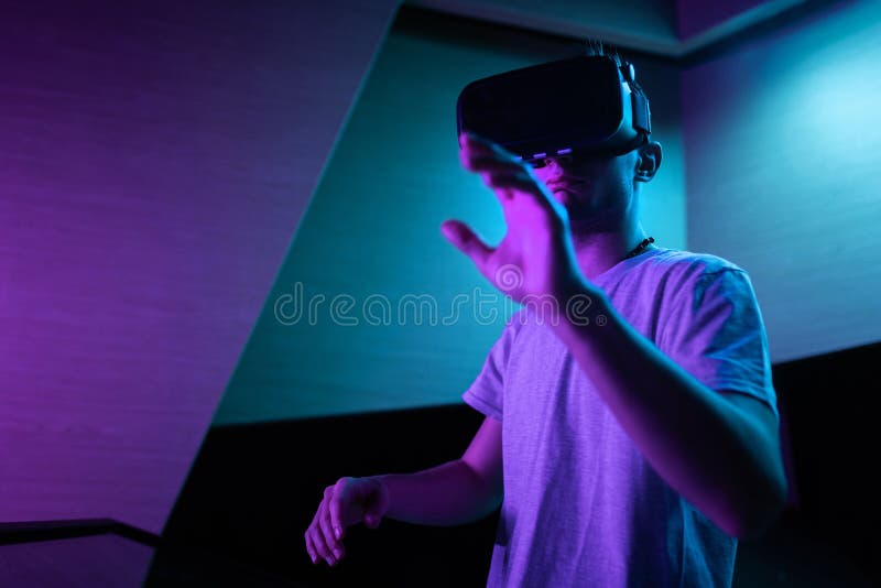 Man Using a VR Headset with Motion Tracking Tech, Make Hand Gestures in ...