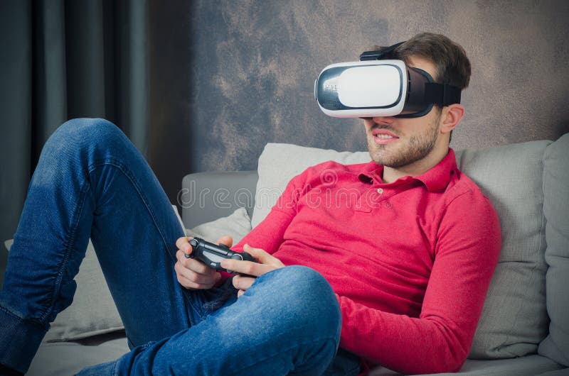 Man Using VR Virtual Reality Glasses and Playing Video Games Stock ...