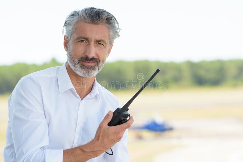 Man Using Walkie Talkie at Container Terminal Stock Image - Image of ...