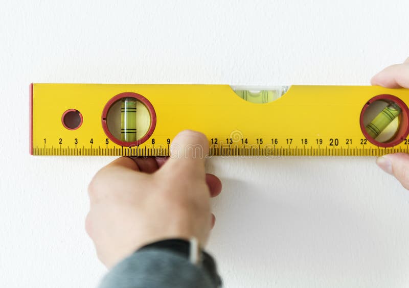 Man Using Water Level Meter Measuring the Wall Stock Photo - Image of ...