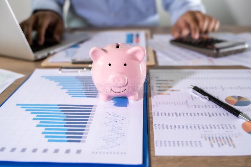 Man Usingcalculator with Money Stack Financial Report- Business ...