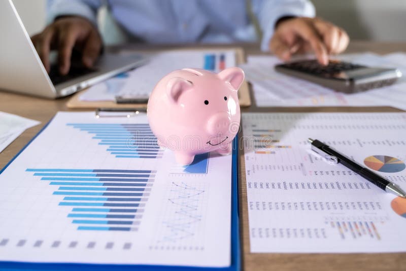 Man Usingcalculator with Money Stack Financial Report- Business ...