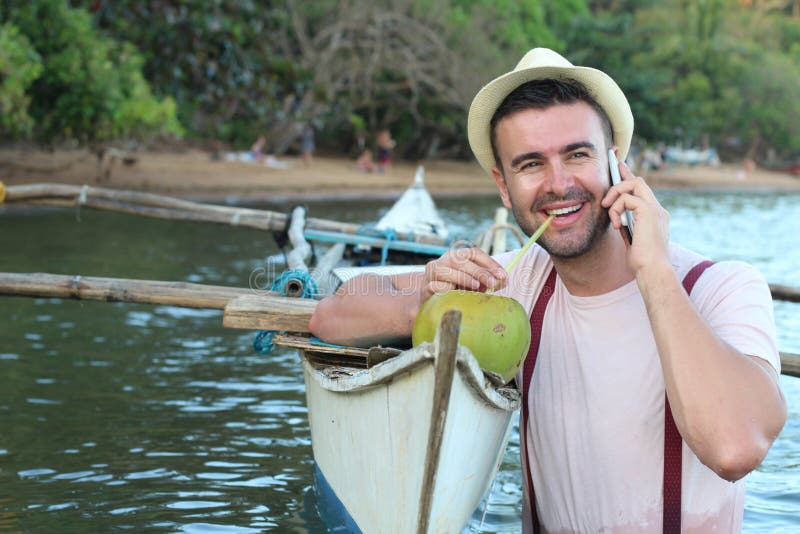 Man on Vacation Jumping into Water while Calling Stock Photo - Image of ...