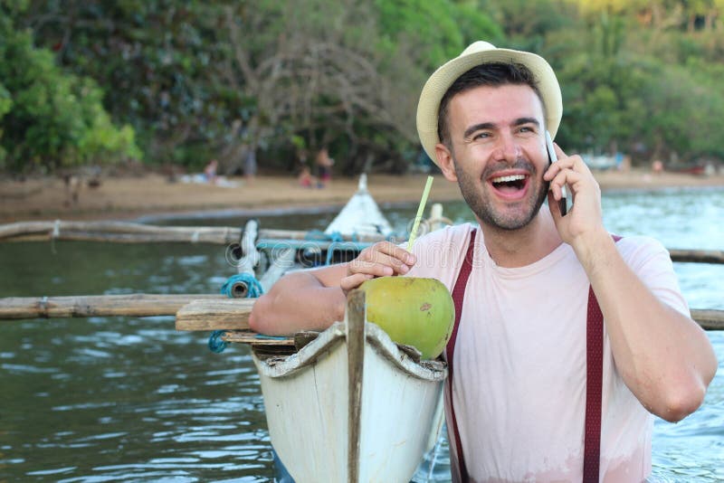 Man on Vacation Jumping into Water while Calling Stock Photo - Image of ...