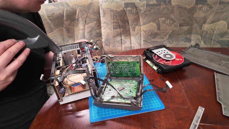 A Man Vacuuming the Inside of a CD Player Boombox Stock Footage - Video ...