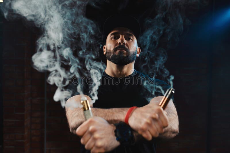 Man Vaping an Electronic Cigarette Stock Image - Image of vapor ...