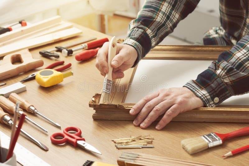 Man Varnishing a Wooden Frame at Home Stock Image - Image of crafts ...