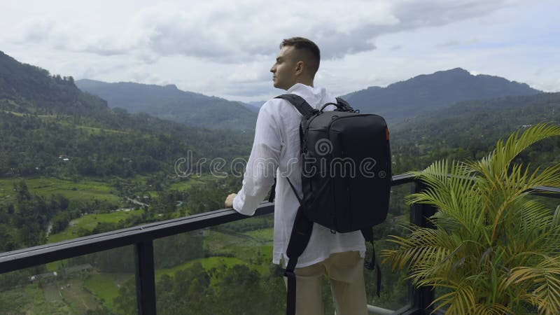 Man with View of Tropical Mountain Valley. Action. Man on Observation ...