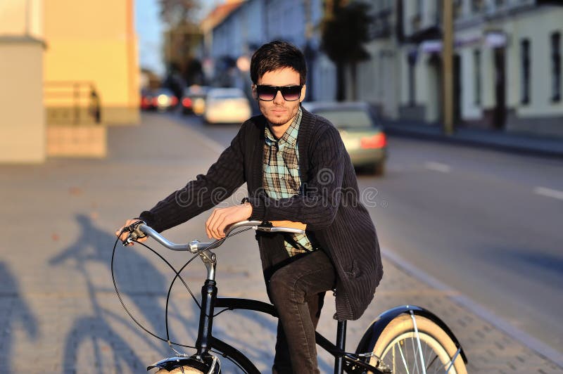 Man on a vintage cycle stock image. Image of street, outdoor - 53720469