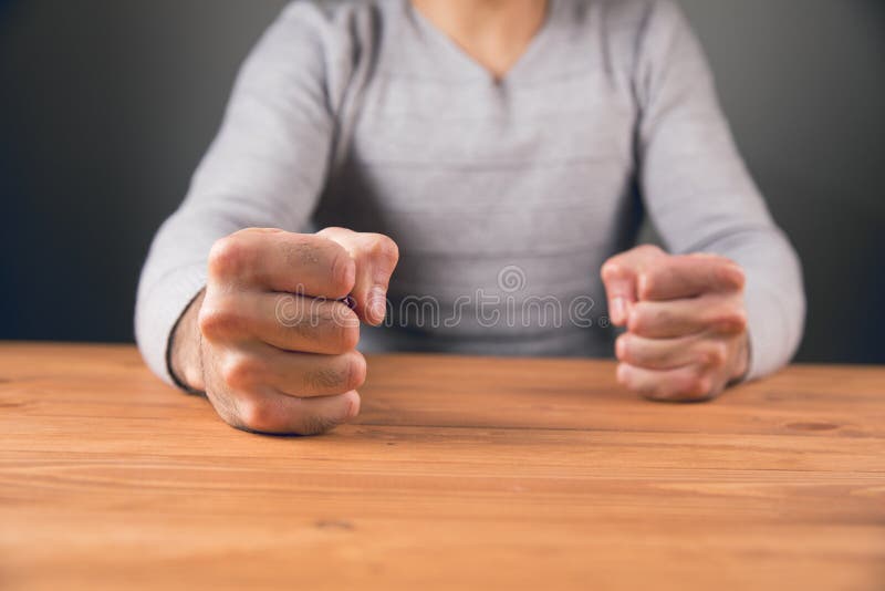 Violently Slams His Fist on the Table Stock Image - Image of aggressive ...