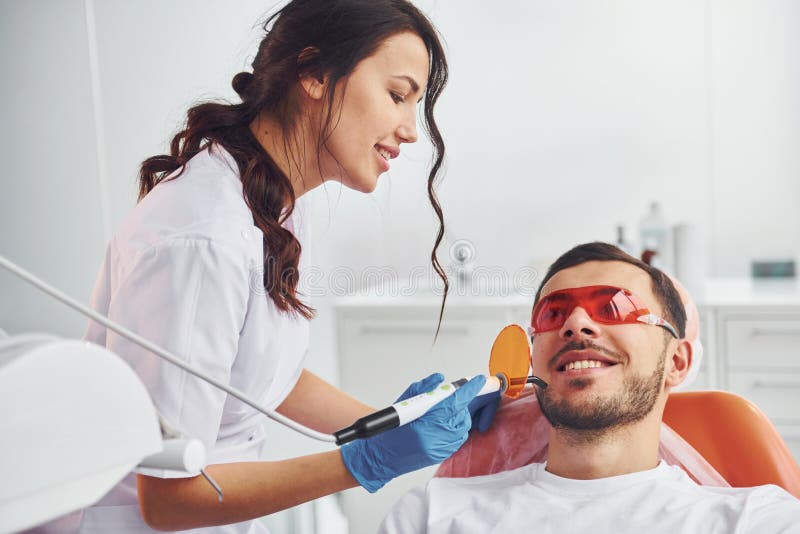Man Visiting Dentist in Clinic. Conception of Stomatology Stock Photo ...