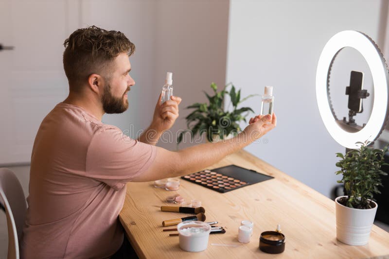 Man Vlogging about Make Up and Beauty Products. Male Shooting a Makeup ...