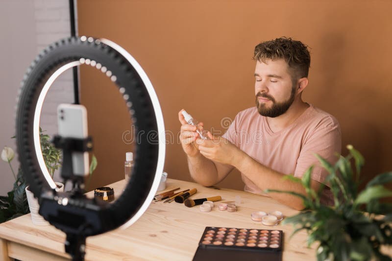 Man Vlogging about Make Up and Beauty Products. Male Shooting a Makeup ...
