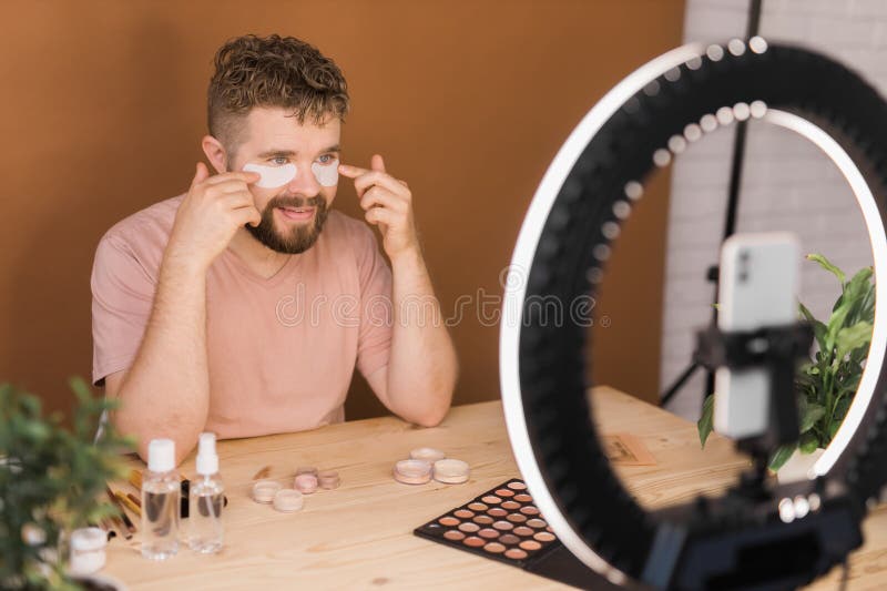 Man Vlogging about Make Up and Beauty Products. Male Shooting a Makeup ...