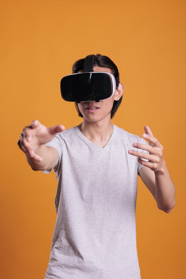 Man in Vr Headset Playing Games, Enjoying Simulation Experience Stock ...