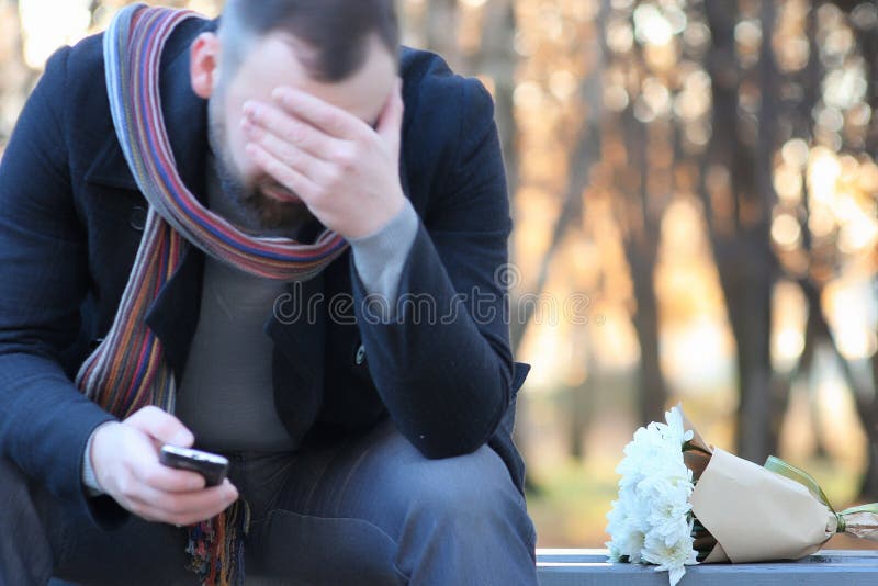 Man Waiting on a Bench the Date in Autumn Park Stock Photo - Image of ...