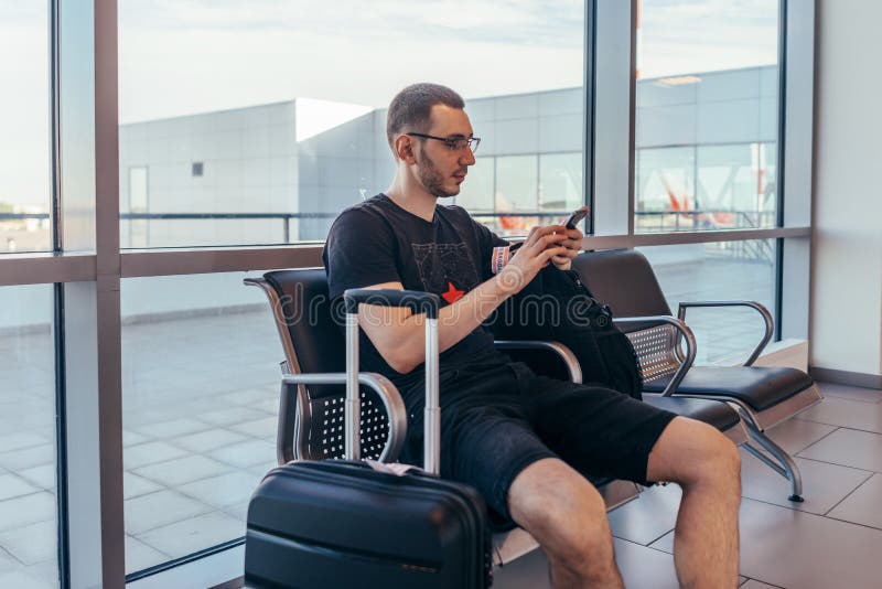 Man Waiting Boarding in Arrival Hall at Airport Stock Photo - Image of ...