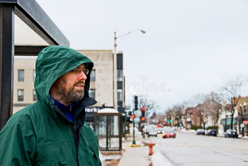 Man waiting at bus stop stock photo. Image of lamp, adult - 7696058