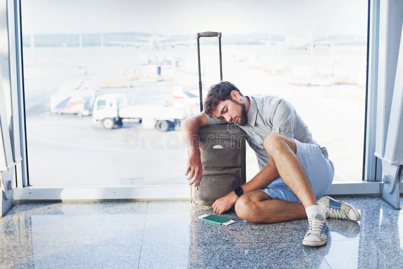 Man Waiting for His Flight in the International Airport Stock Photo ...