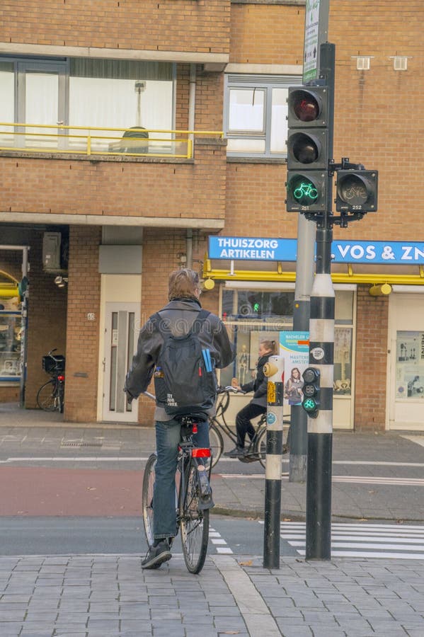 Man Waiting at the Red Light at Amsterdam the Netherlands Editorial ...