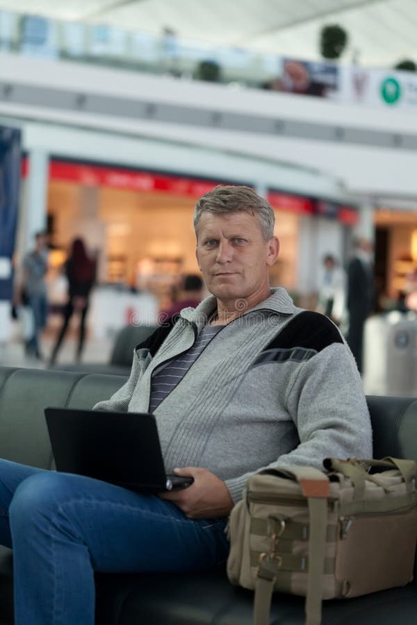 Man in a waiting room stock photo. Image of passenger - 25794530