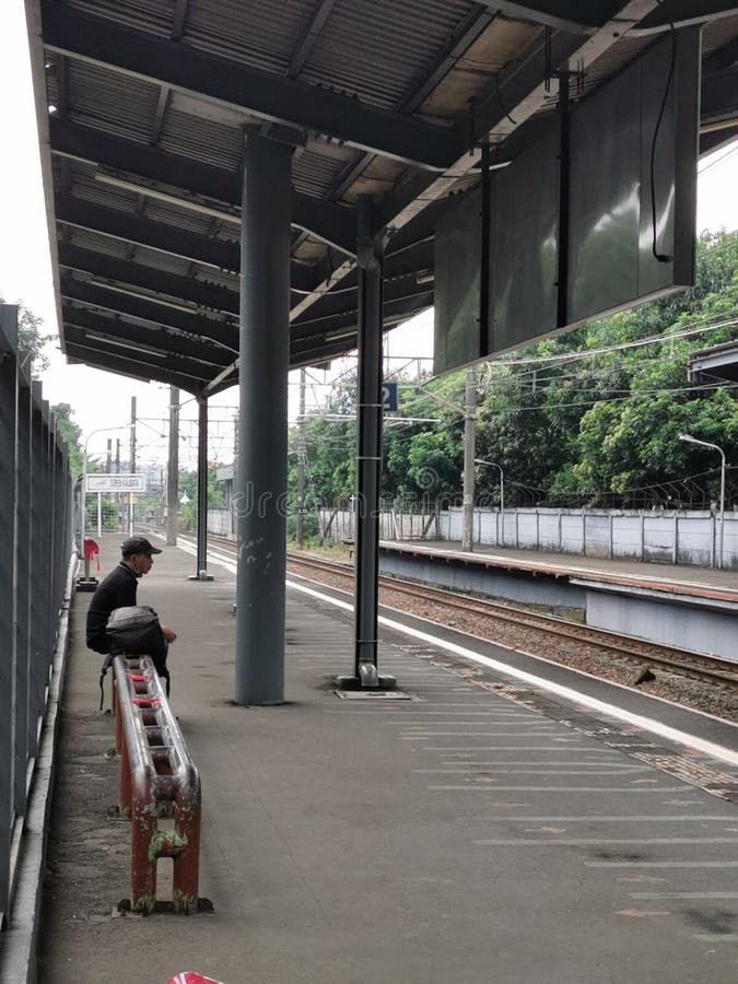 A man is waiting for train editorial stock image. Image of waitin ...