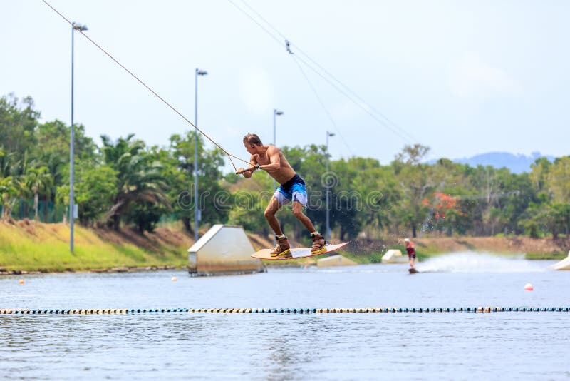 Man Wakeboarding. Jumping stock photo. Image of adventure - 95270636
