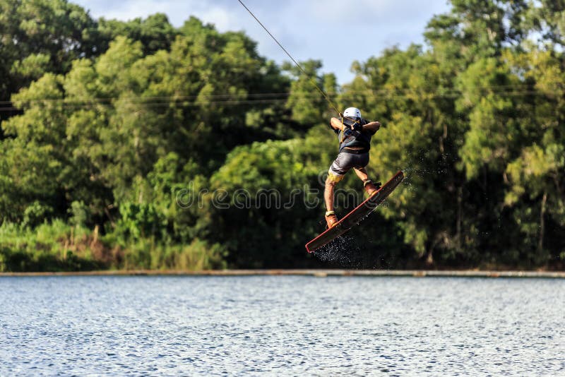 Man Wakeboarding. Jumping stock photo. Image of lake - 56366388