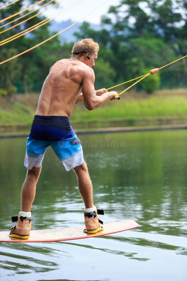 Man Wakeboarding Starting stock image. Image of enjoyment - 81522065