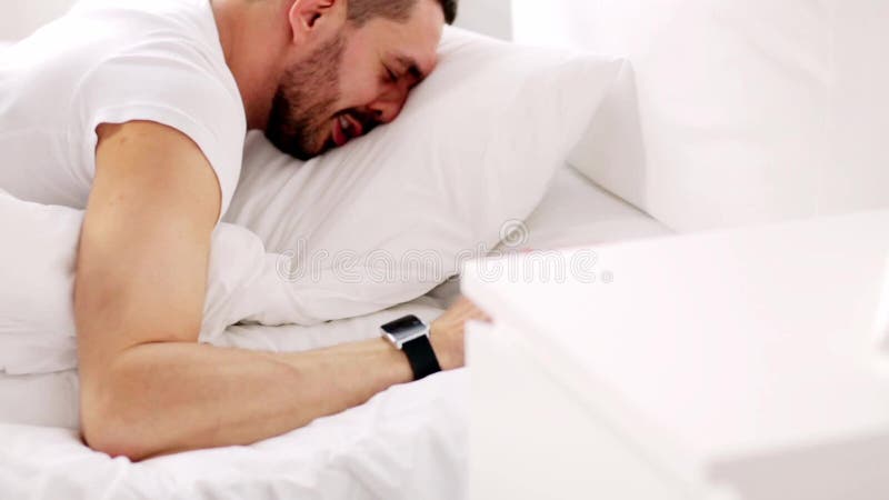 Man Waking Up in Bed at Home Stock Footage - Video of relaxing, bedding ...