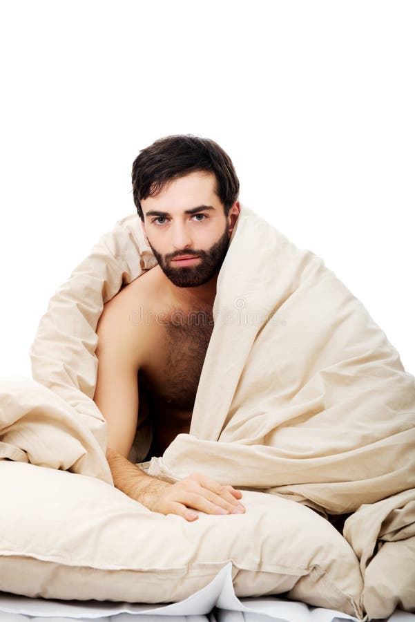Man waking up in bed. stock photo. Image of domestic - 49721128