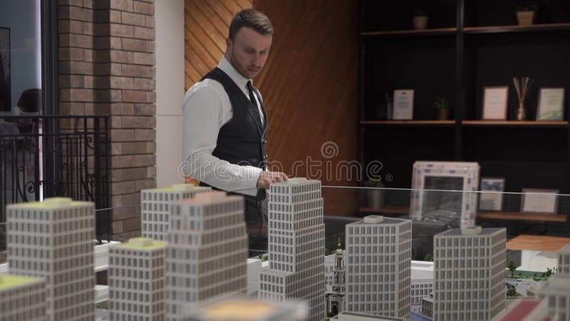 Man is Walking Around the Layout Stock Footage - Video of architectural ...