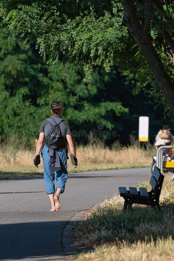 Man walking barefoot stock image. Image of outdoors - 265609475