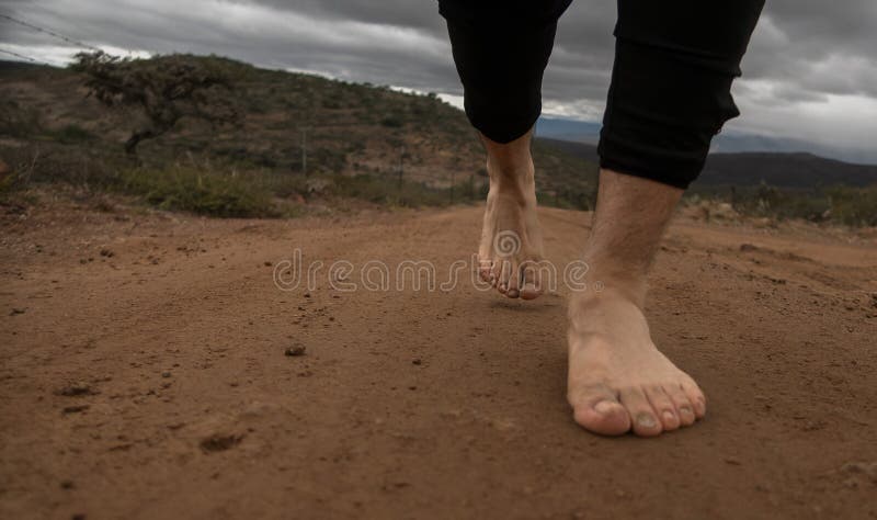 Man Walking Barefoot in Nature with Space for Text on the Left Stock ...