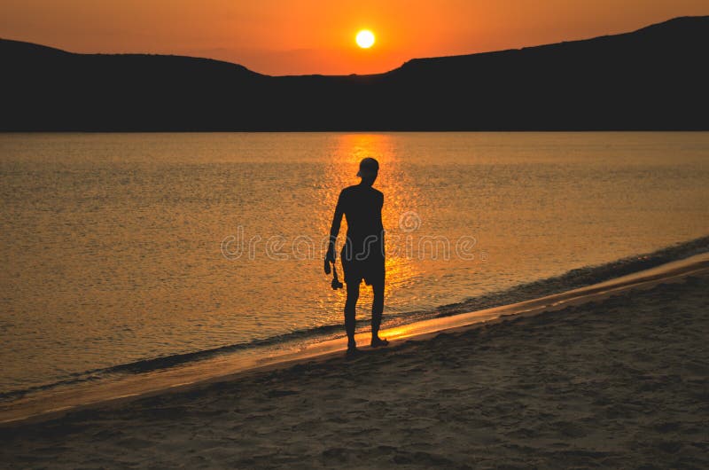 Man Walking On Beach At Sunset Stock Image Image Of Colorul Europe