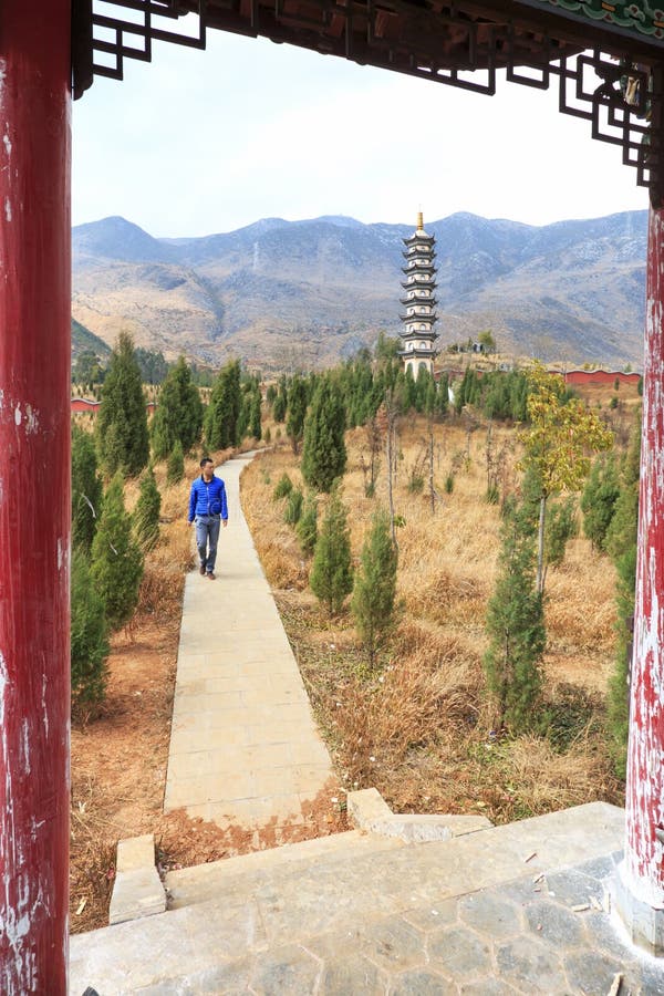 Man Walking in the Complex of the Heyang Temple in Heqing, Yunnan in ...