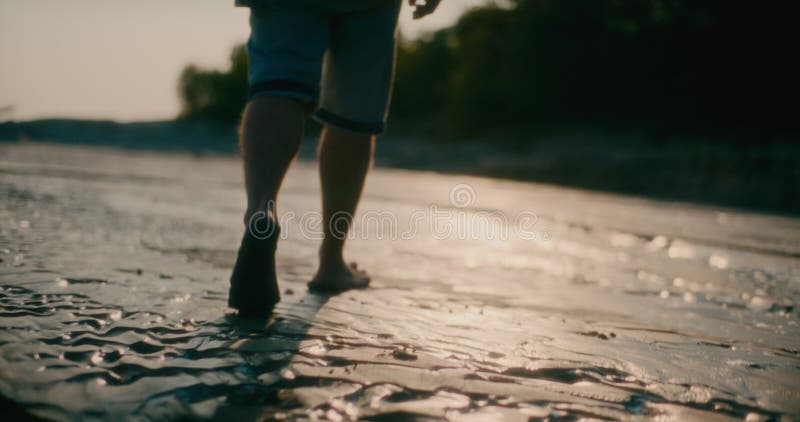 Man Walking on Dry Earth River Alone Man Footsteps Footprints Stock ...