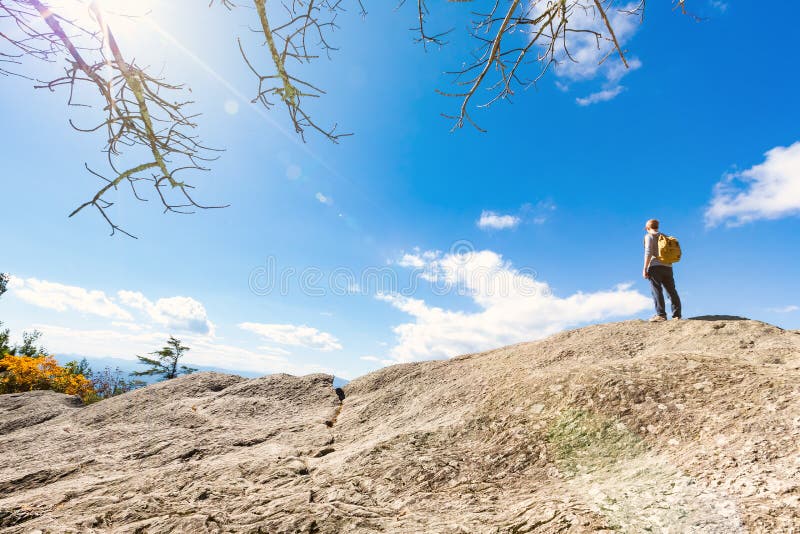 Man Walking on the Edge of a Cliff Stock Photo - Image of peak, freedom ...