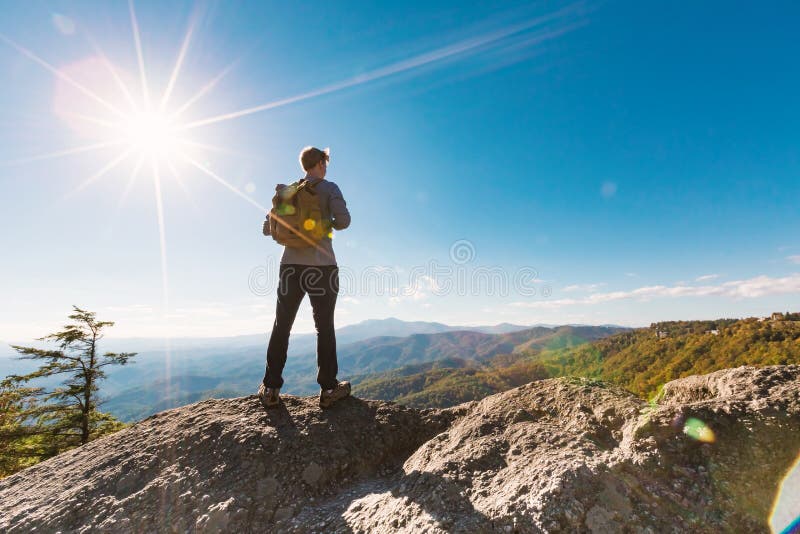 Man Walking on the Edge of a Cliff Stock Photo - Image of overlook ...