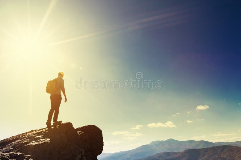 Man Walking on the Edge of a Cliff Stock Image - Image of filtered ...