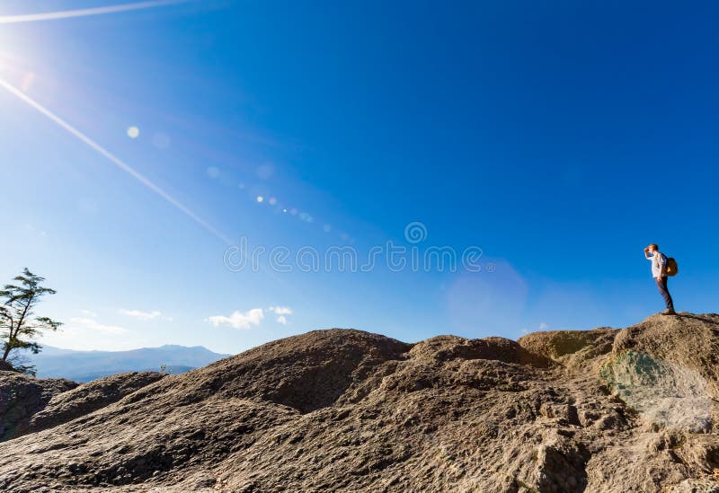 Man Walking on the Edge of a Cliff Stock Image - Image of hiker ...