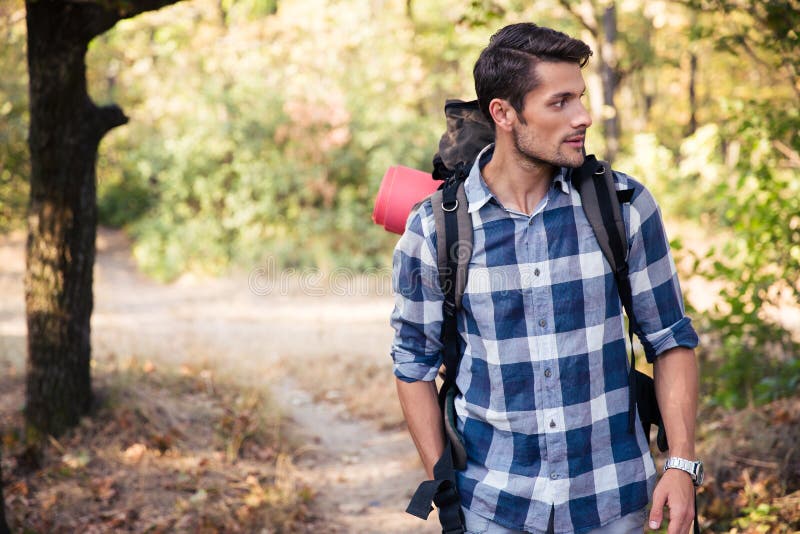 Man Walking in Forest with Marching Backpack Stock Photo - Image of ...