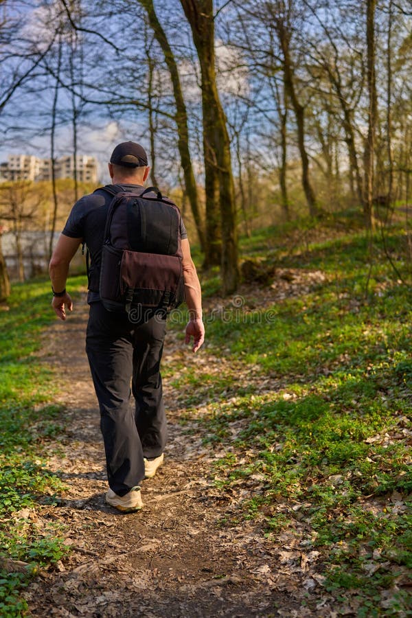 Man Walking on Forest Trail Stock Photo - Image of fitness, undergrowth ...