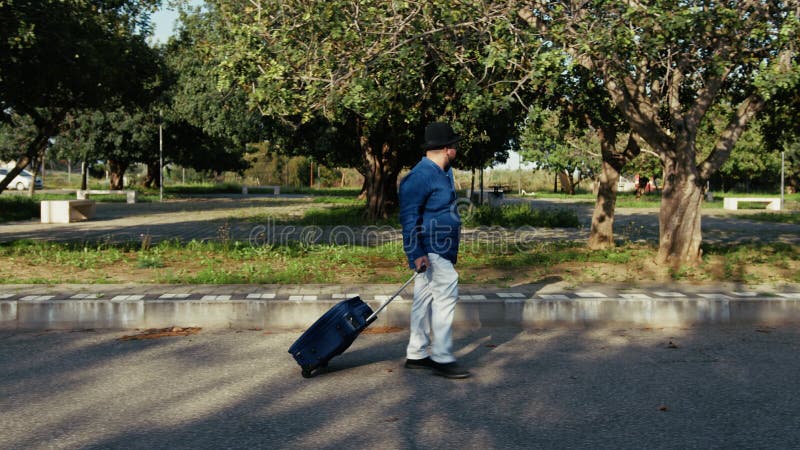 Man Walking with His Suitcase during a Trip Stock Video - Video of ...