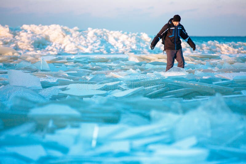 Man Walking Icy Beach Along Baltic Sea Stock Photos - Free & Royalty ...