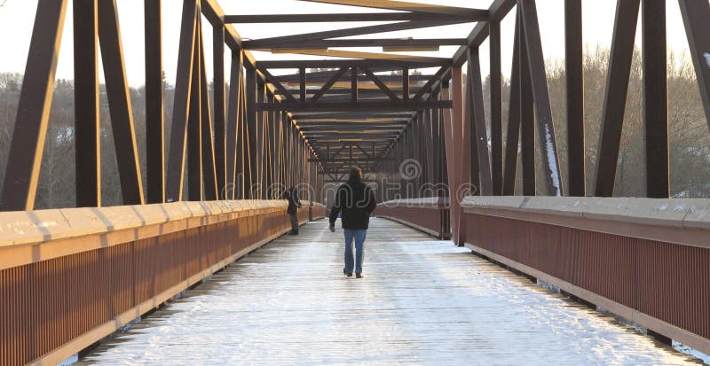 Man Walking Over Footbridge Stock Image - Image of outside, snow: 3768901