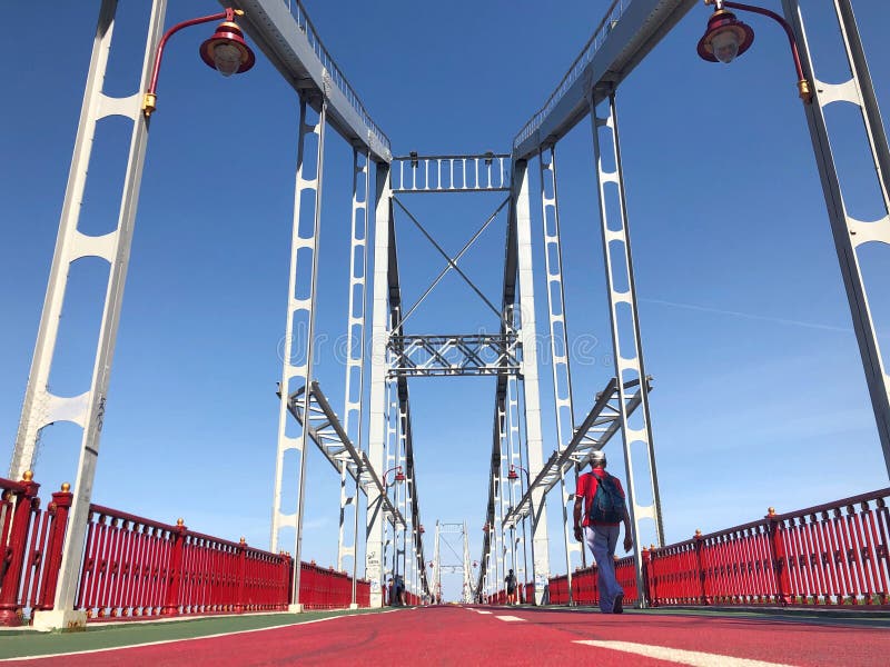 A Man Walking on a Pedestrian Bridge Stock Photo - Image of travel ...
