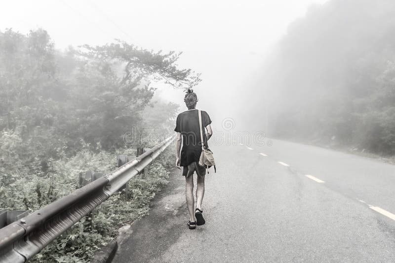 Man Walking on the Road in Fog Stock Photo - Image of tourist, outdoor ...